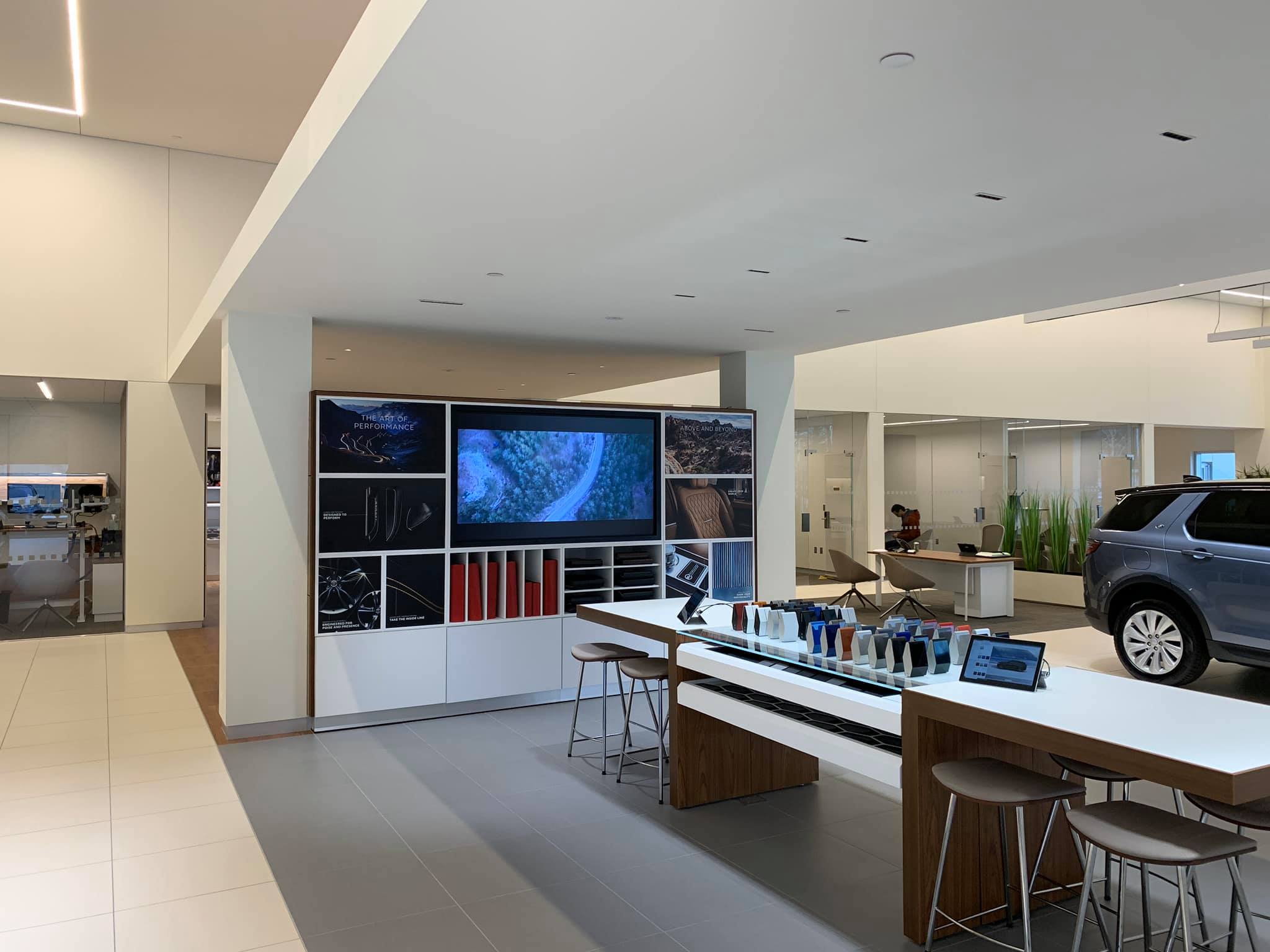 dealership-lobby-with-table – Baker Associates